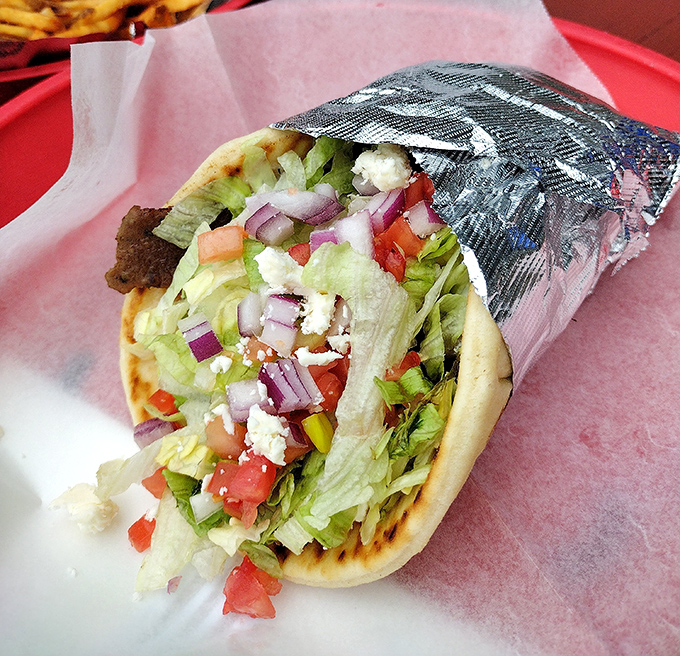 This gyro isn't just wrapped in foil&mdash;it's wrapped in flavor. Fresh veggies and feta provide the perfect cool counterpoint to seasoned lamb. 