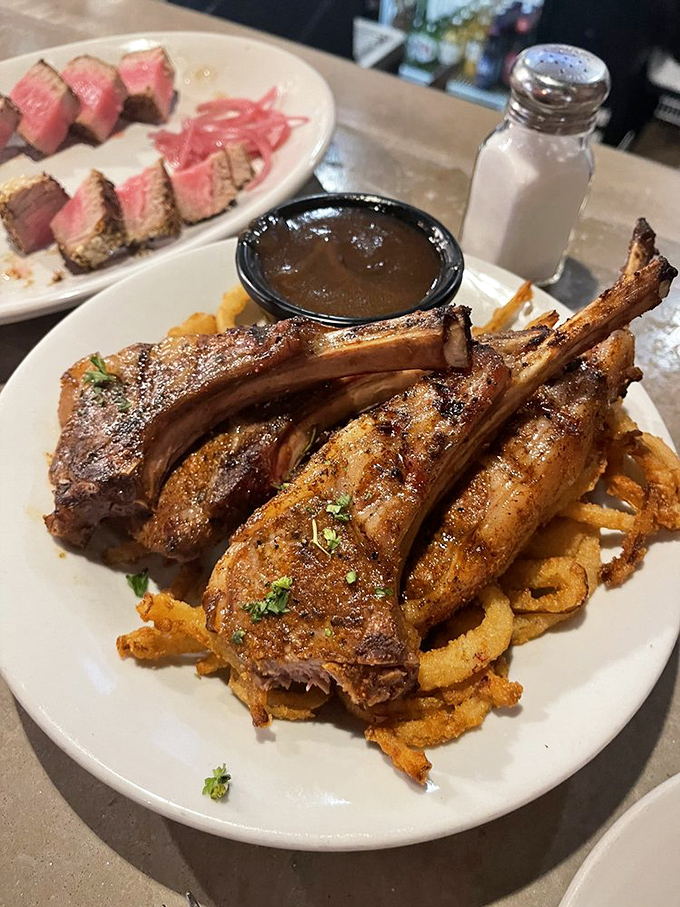 Lamb lollipops that would make your grandmother's Sunday roast jealous. The presentation says fine dining; the flavor says "where have you been all my life?"