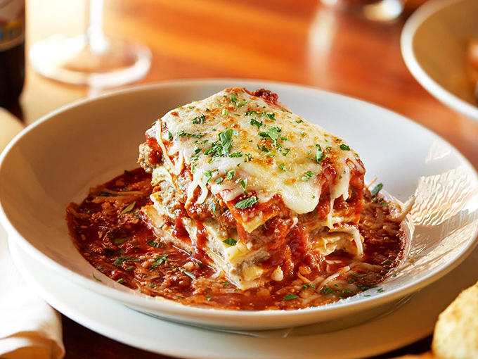 Lasagna so perfectly layered it could teach geometry classes, with cheese pulls that deserve their own Instagram account.