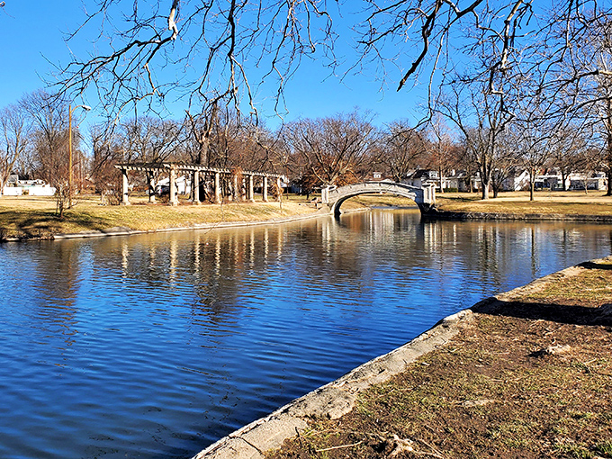 Liberty Park's serene lagoon offers the perfect respite from modern chaos – nature's version of noise-canceling headphones.