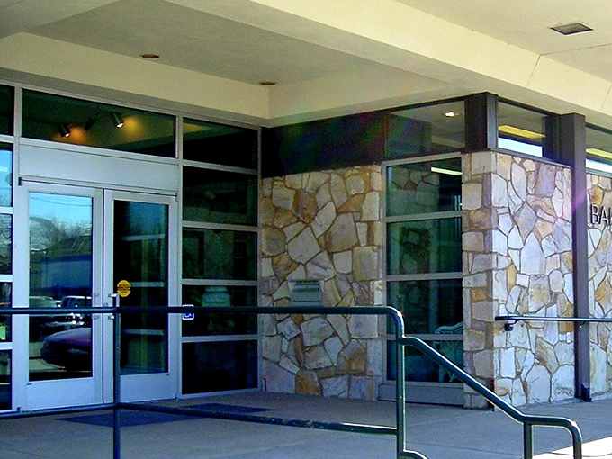 The Carnegie Library now houses the Crossroads Art Center, where "ART" banners and hanging flower baskets announce culture with small-town flair.