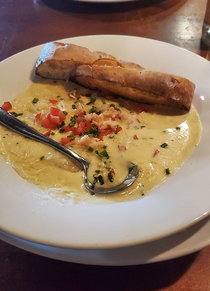 This lobster ravioli doesn't just swim in sauce&mdash;it luxuriates in it, like a crustacean taking a bath in liquid gold flecked with fresh herbs.