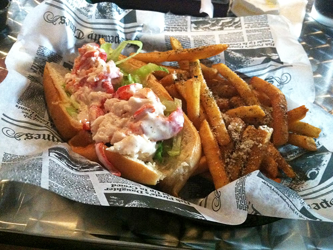 Ocean meets artistry in this lobster roll masterpiece. The seasoned fries stand at attention, ready to complete your Keys culinary adventure.