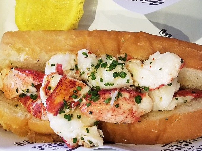 The lobster roll here doesn't mess around—chunks of sweet meat barely contained by a perfectly toasted bun. No passport to Maine required.