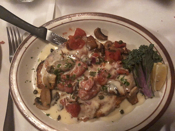 The Lobster Francaise arrives like a work of art, with mushrooms and tomatoes playing supporting roles to the succulent star.