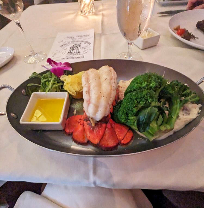 Lobster tail and fresh vegetables&mdash;proof that seafood doesn't play second fiddle at this steakhouse. That butter sauce is practically begging to be sopped up.