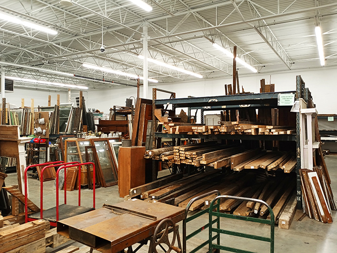 Woodworker's paradise or architectural salvage goldmine? Either way, these lumber stacks hold the bones of future restoration projects.