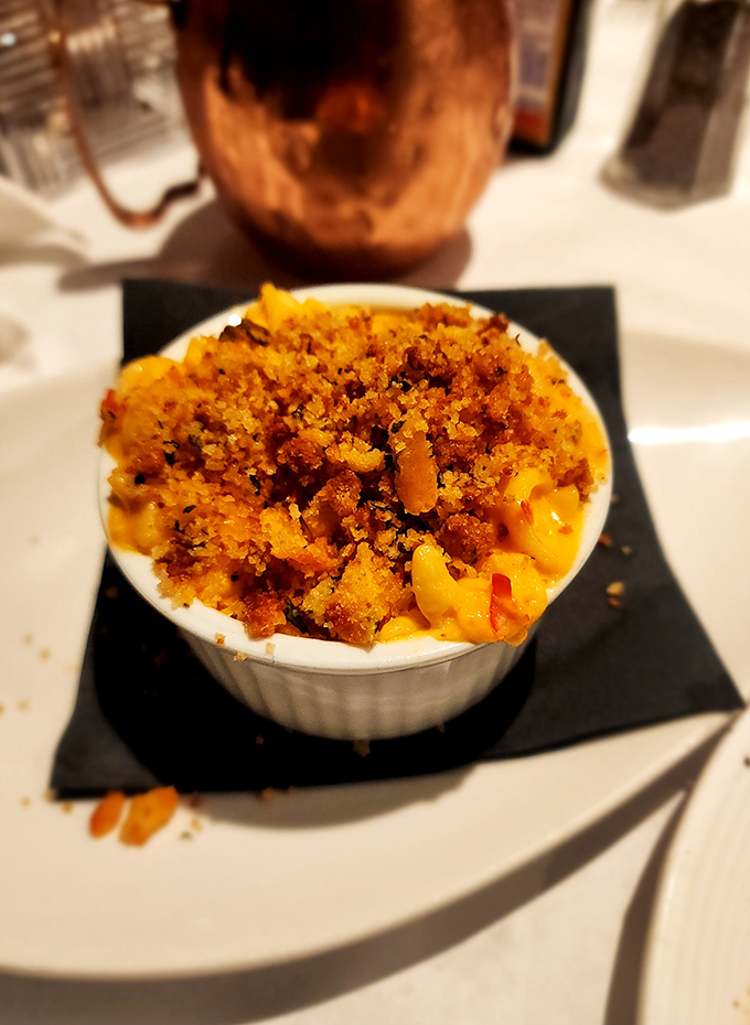 Mac and cheese that would make your grandmother both proud and jealous. That golden breadcrumb topping is the crown jewel of comfort food royalty.