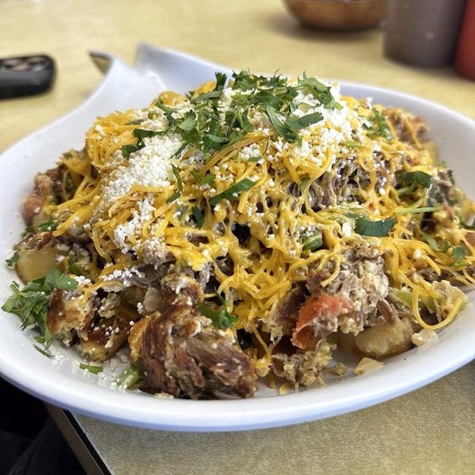 Machaca and eggs topped with melted cheese and fresh cilantro&mdash;proof that sometimes the most photogenic dishes are also the most delicious.