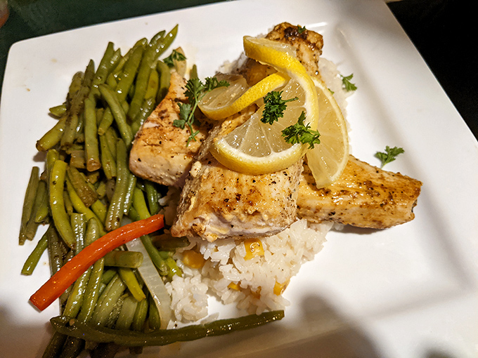 The Mahi Mahi arrives like Florida sunshine on a plate. Perfectly grilled fish, vibrant vegetables, and enough citrus to make your taste buds do the cha-cha.