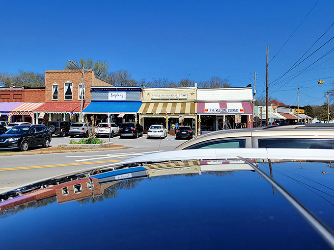 Patriotic bunting adorns these century-old porches, where rocking chairs await storytellers and the art of conversation still thrives.