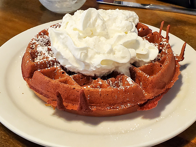 A malted waffle so golden and perfect, it practically glows with breakfast divinity and buttery promise.