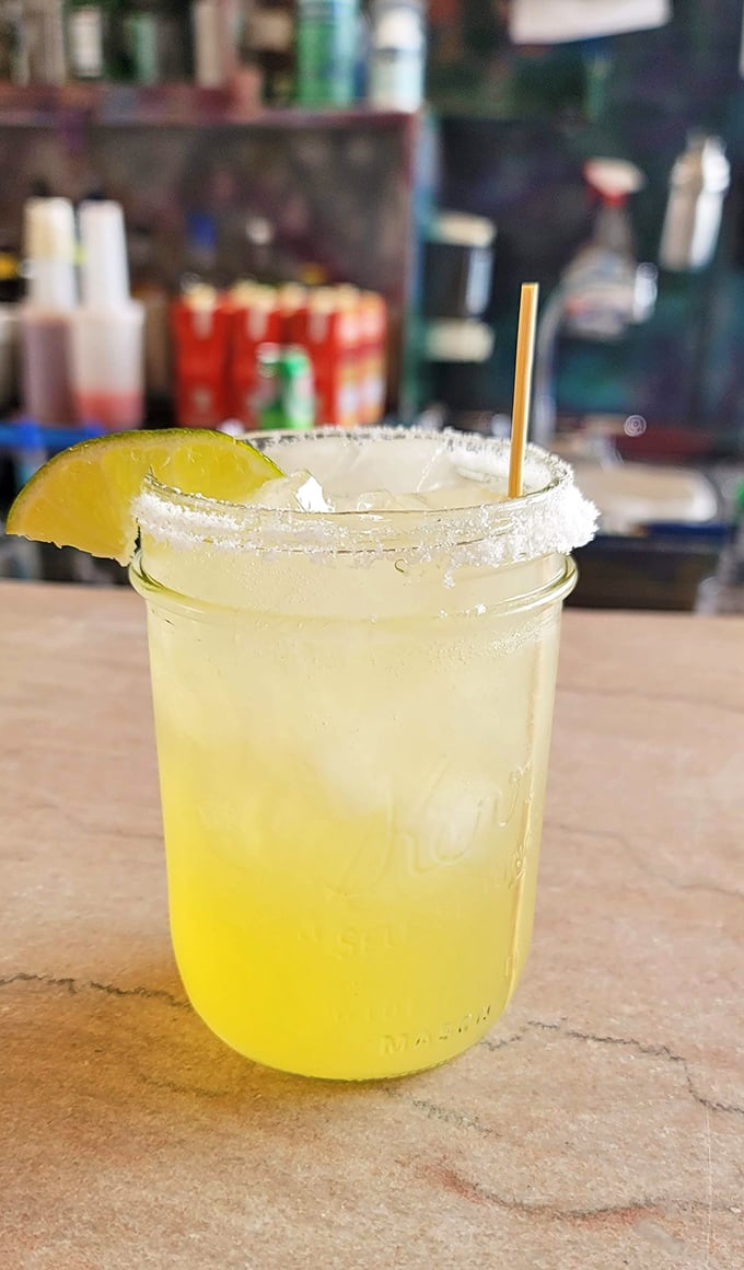 The perfect marriage of tart and sweet. This sunshine-yellow margarita, rimmed with salt and adorned with lime, is summer's official ambassador.