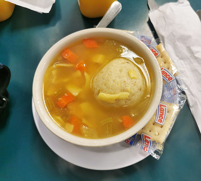 This matzo ball soup isn't just comfort food&mdash;it's a warm hug in liquid form, with a matzo ball that floats like a cloud in chicken-y paradise.