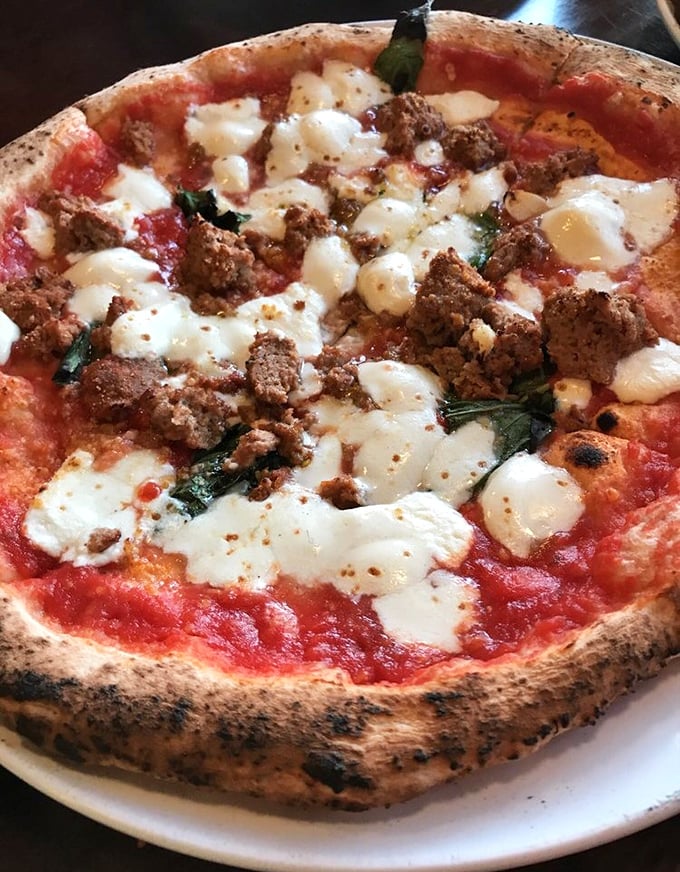 Meat the perfect pizza. Those little islands of sausage surrounded by pools of melted mozzarella are basically flavor archipelagos.