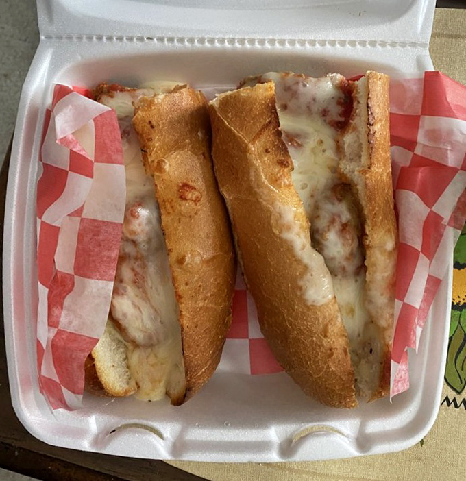 A proper meatball sub should require both hands and several napkins. This beauty demands a stack of them and possibly a bib.