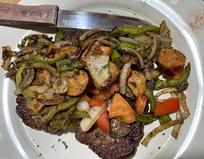 Vegetables dancing around a perfectly seasoned steak&mdash;proof that sometimes the best relationships are the ones that sizzle together on a hot grill.