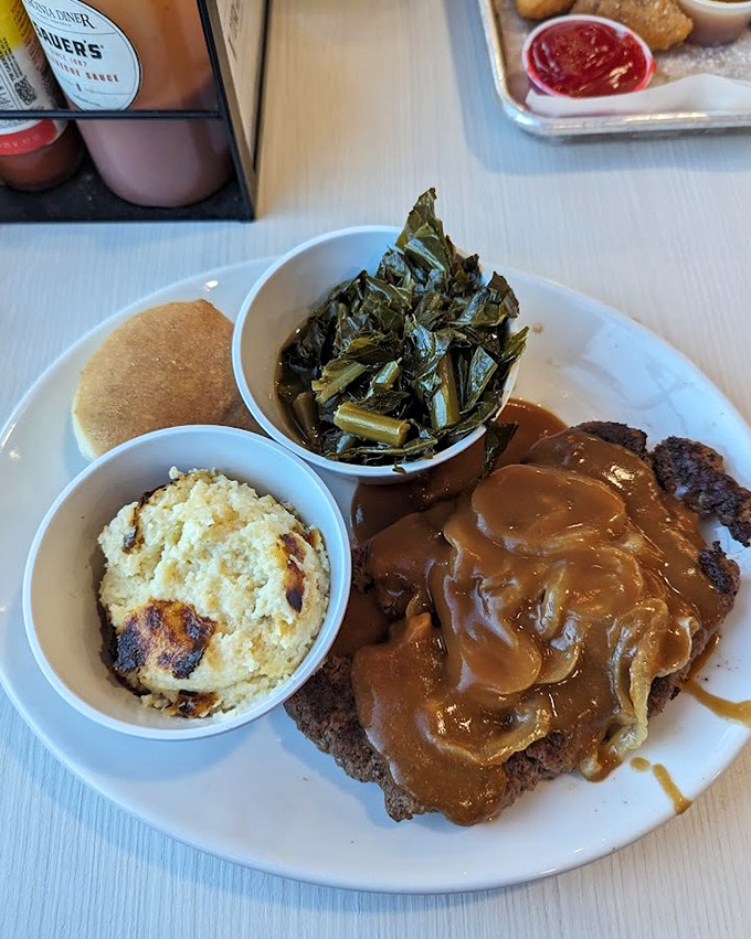 Country-fried steak swimming in gravy alongside collard greens and cornbread &ndash; a Southern trinity that could make angels weep with joy.