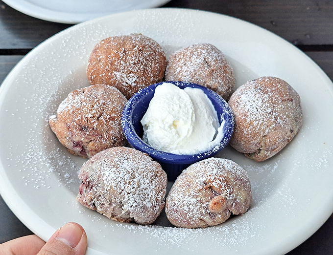 These powdered mini scones with clotted cream aren't just pastries &ndash; they're time machines to afternoon tea with your imaginary British grandmother.