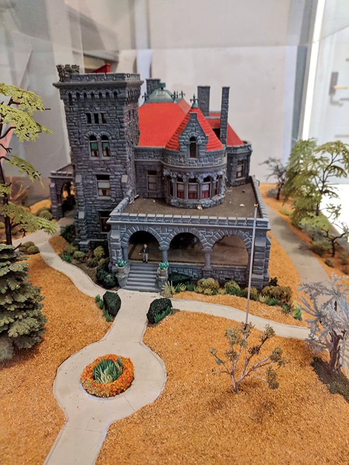 This detailed miniature captures Rhodes Hall's architectural complexity. Like a dollhouse for giants, it showcases every turret and archway in perfect proportion.