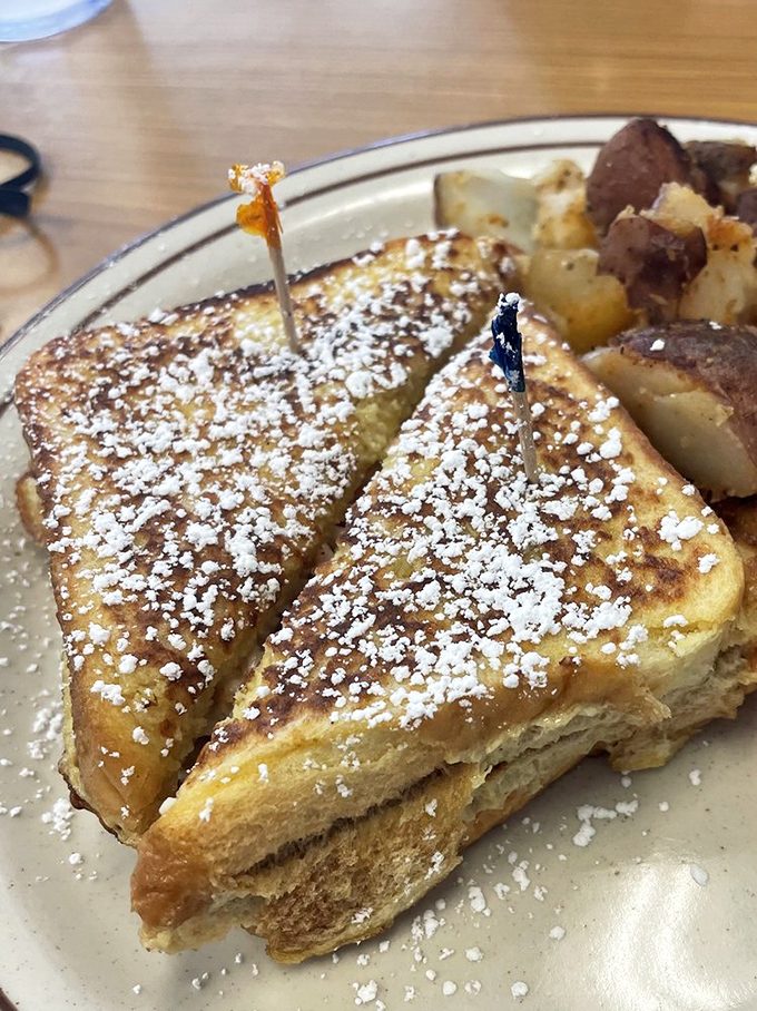 Monte Cristo Sandwich that's actually worth getting out of bed for. Dusted with powdered sugar and served with home fries, it's breakfast that hugs you from the inside.