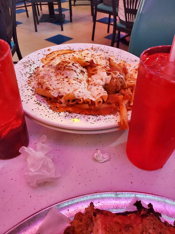 Their mostaccioli isn't just pasta&mdash;it's a saucy, cheesy reminder that Vito & Nick's mastery extends beyond their famous pies.