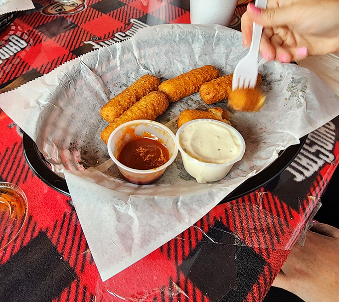 Crispy on the outside, molten heaven within. These golden mozzarella sticks are the perfect opening act before the main event hits your table.
