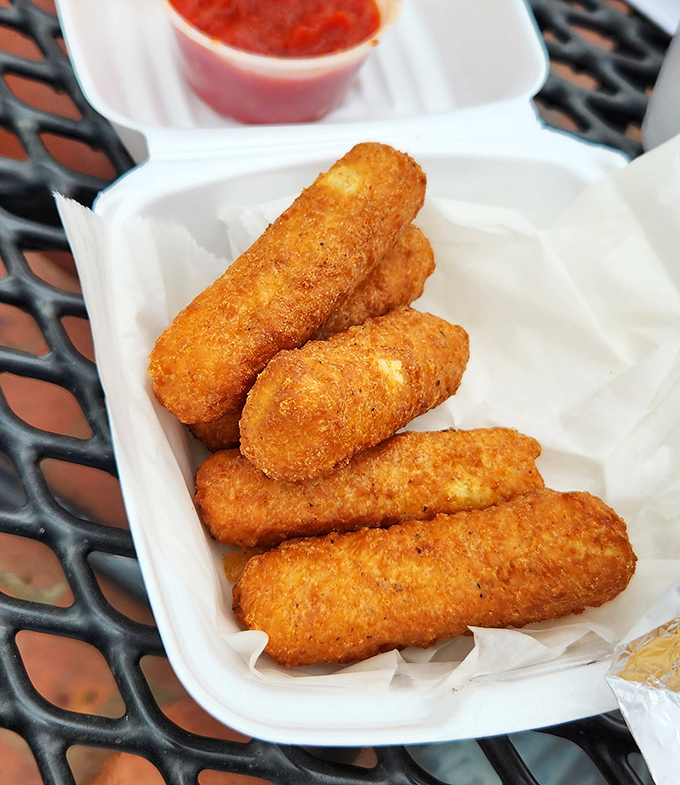 Golden-brown mozzarella sticks with marinara for dipping&mdash;the appetizer that's never gone out of style for good reason. 