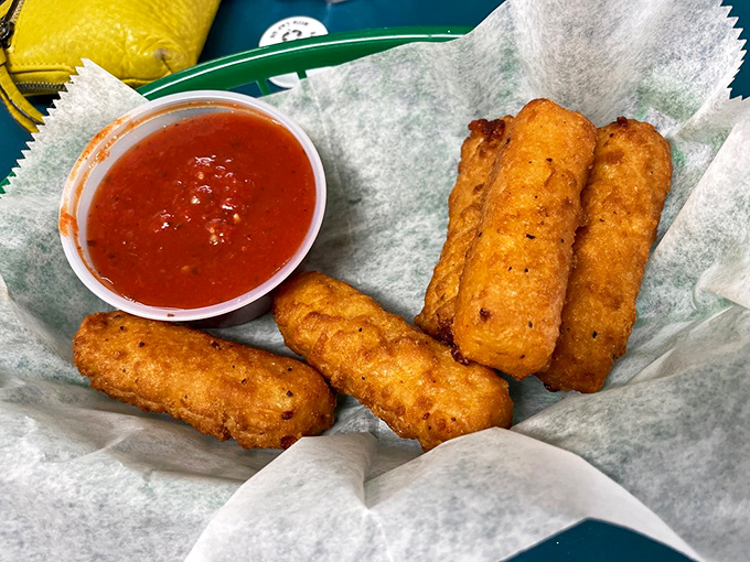 Golden-fried mozzarella sticks&mdash;the appetizer equivalent of a warm hug, where the cheese pull is measured in feet rather than inches. Marinara mandatory.