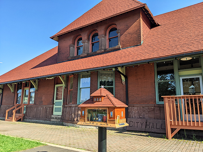 Ironwood's City Hall wears its history proudly, with a charming little library box outside that says, "Yes, we still believe in community."