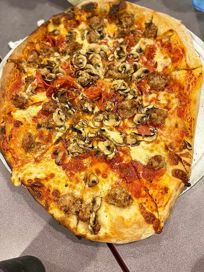 Mushrooms, sausage, and pepperoni living in delicious harmony. This pie has more layers of flavor than your favorite prestige TV drama.