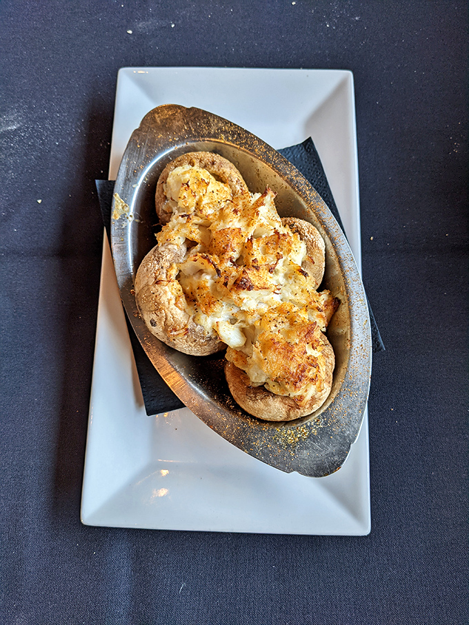 Delicious stuffed mushrooms bring savory flavors and cheesy goodness to every perfect bite.