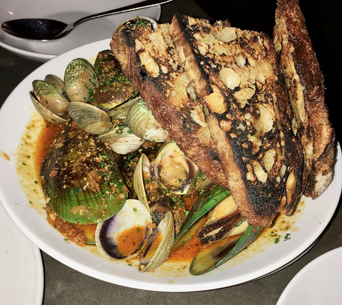 Not your average seafood dish&mdash;these mussels and clams swim in a broth so good you'll contemplate drinking it straight from the bowl.