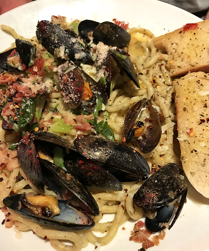 These mussels are swimming in a sea of garlicky goodness that'll transport you straight to the Italian coast.
