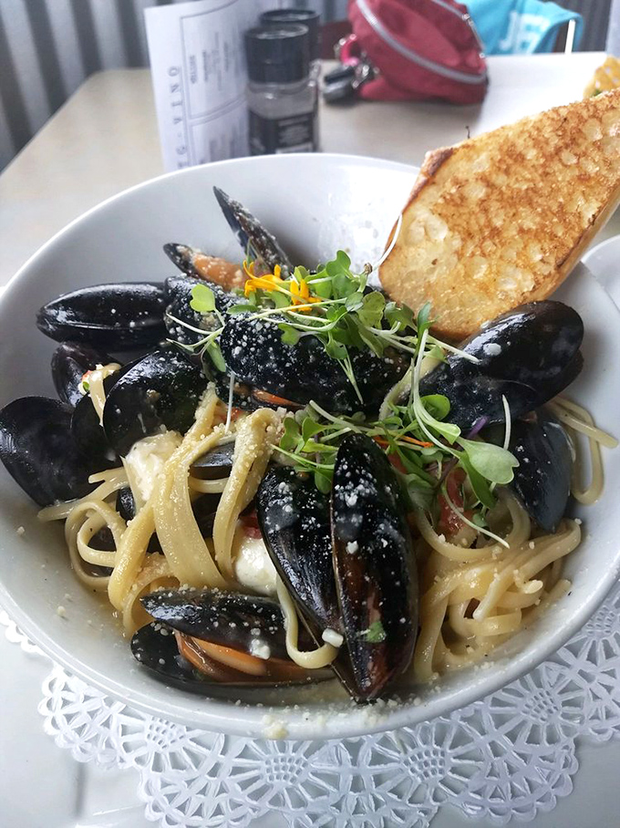 These mussels linguine aren't just dinner; they're a maritime symphony in a bowl, with each shell opening to reveal treasures worth diving for.