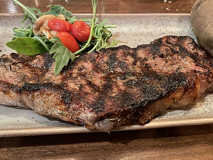 This NY Strip has more character than most Hollywood blockbusters. The grill marks alone deserve their own Instagram account.