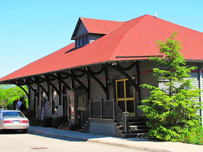 This isn't just an old train depot; it's where countless Michigan summers began for generations of families arriving with overpacked suitcases and underpacked schedules.