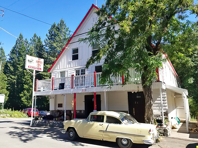 The Old Sierra City Hotel stands proudly in its red and white glory, looking like it's been waiting since the Gold Rush for you to finally show up.