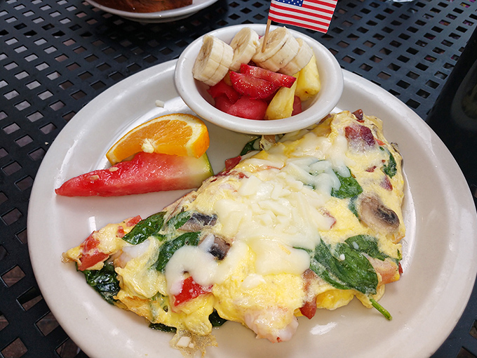 An omelet so generously stuffed, it's practically bursting at the seams like your uncle at Thanksgiving dinner.