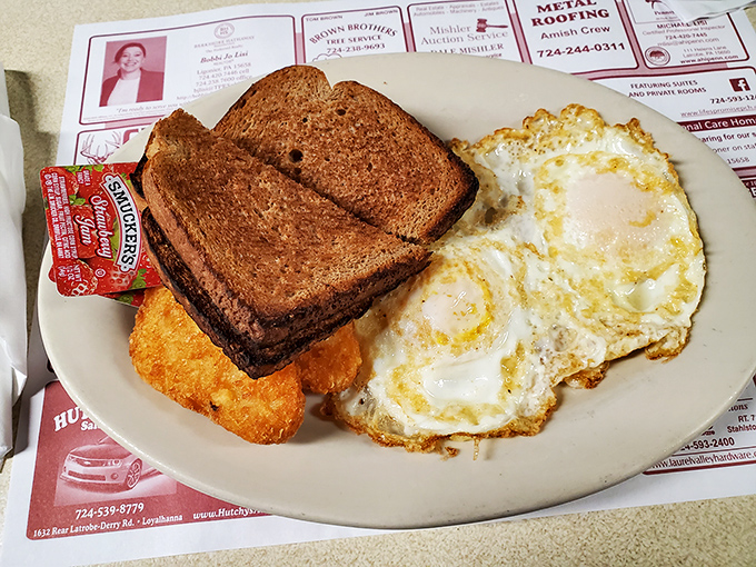Breakfast perfection on a plate &ndash; where eggs, toast, and hash browns form the holy trinity of morning satisfaction.