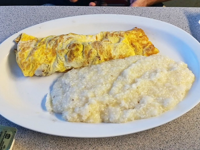 When your omelet comes with a side of creamy grits, you know you've found authentic Southern comfort.