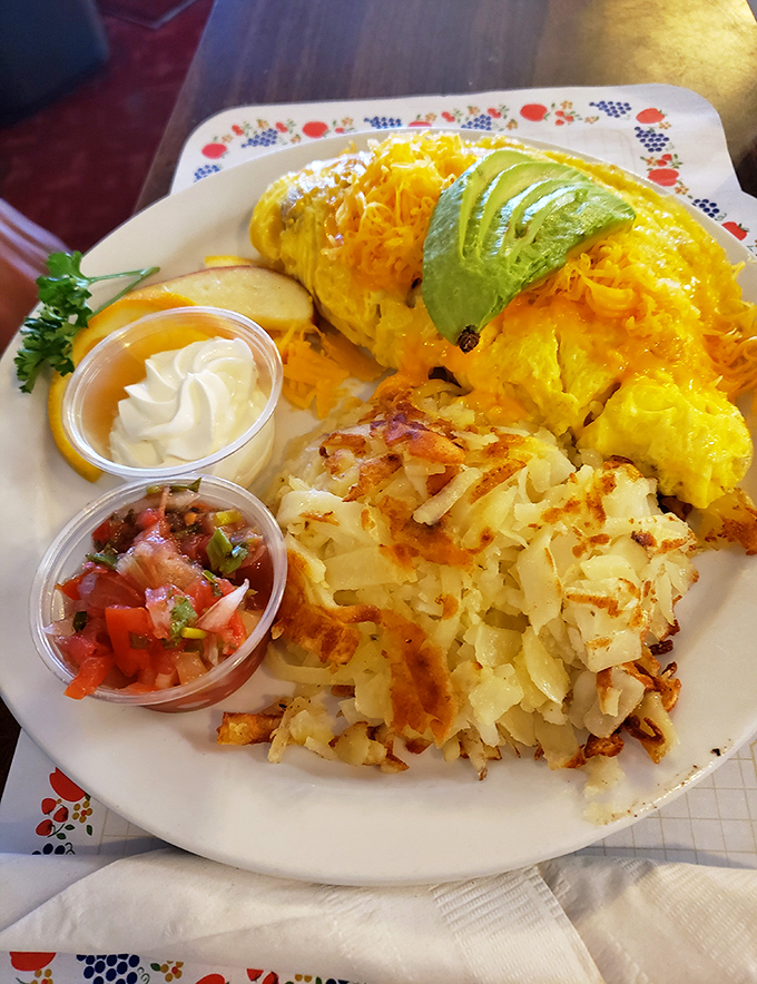 This omelet is what happens when eggs achieve their highest purpose. Avocado, cheese, and crispy potatoes create the breakfast trifecta.
