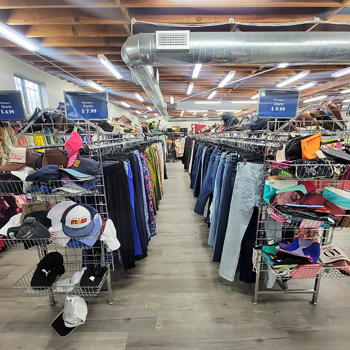 Rows of neatly arranged clothing await their second chance, organized by size and type&mdash;a rarity in the thrift store universe.