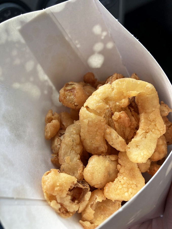 Golden, crispy pork rinds that shatter with each bite&mdash;the perfect companion while waiting for burger perfection to arrive.