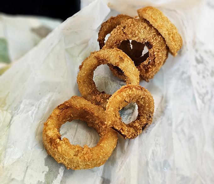 Golden rings of happiness that crunch loud enough to announce your enjoyment to neighboring cars. Onion jewelry never tasted so good.