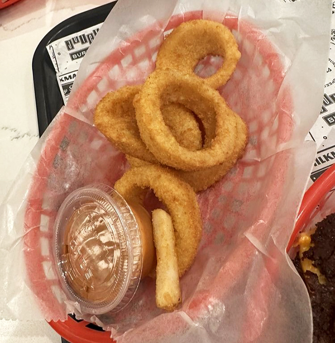 Golden halos of happiness. These onion rings achieve that mythical balance of crispy exterior and sweet, tender interior that makes time stand still.