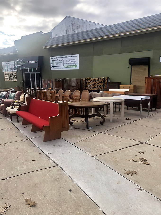 Outdoor furniture display that screams "adopt me!" That church pew in red could be the conversation piece your living room has been missing.