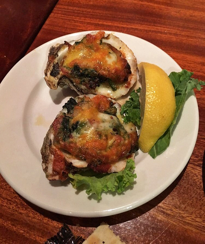 Oysters Rockefeller that would make the actual Rockefellers jealous – spinach, bacon, and cheese creating the ultimate seafood power trio