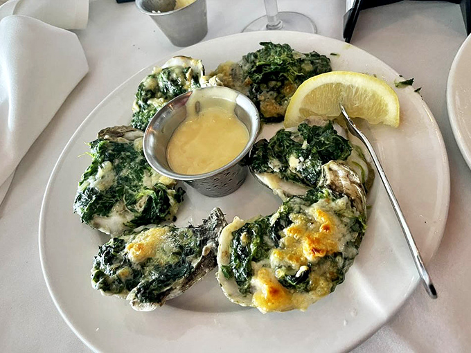 Oysters Rockefeller that would make the Vanderbilts jealous. These spinach-topped beauties prove that vegetables can be decadent when properly introduced to seafood.