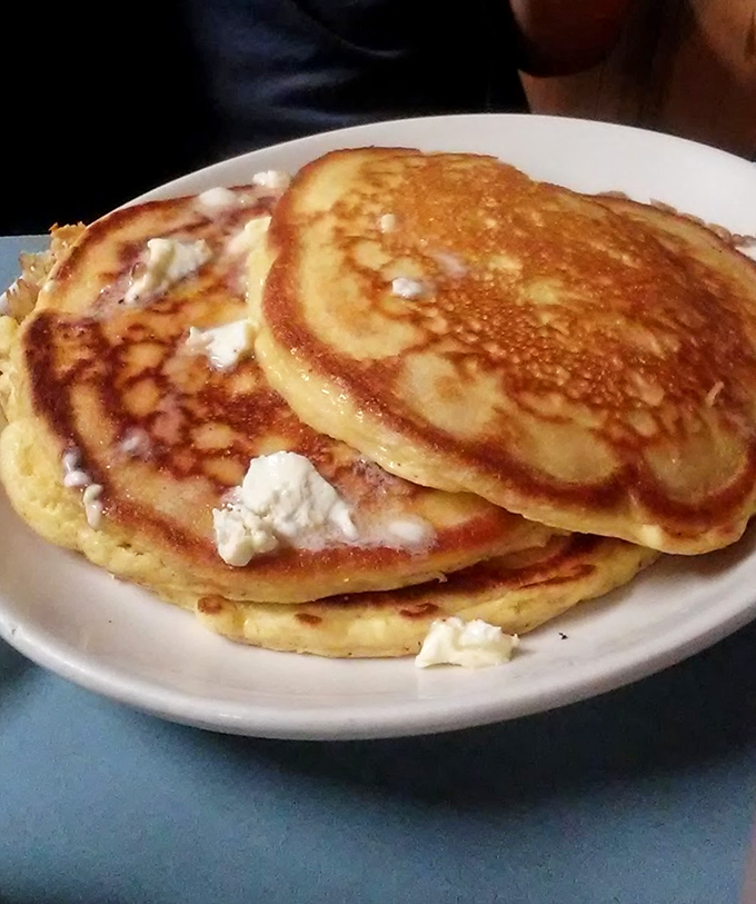 Golden pancakes with melting butter pats that create little pools of deliciousness&mdash;the breakfast equivalent of jumping into a perfect swimming hole.